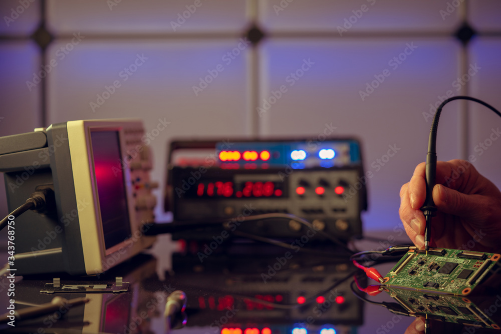 Debugging electronics device. PCB witch microcontroller in electronics laboratory Stock Photo ...