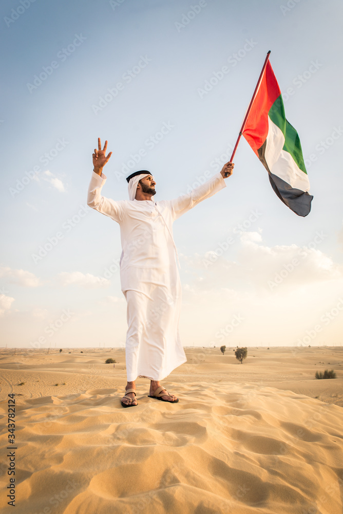 Arabic men in the desert Stock Photo | Adobe Stock