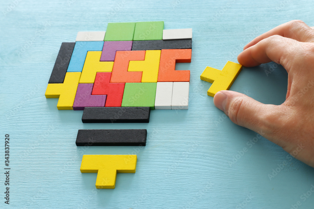 Inspiration concept puzzle shaped as light bulb metaphor . finding the ...