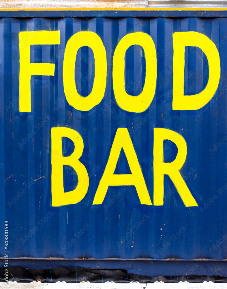 "Food Bar" sign on shipping container on fairground, Clapham Common ...