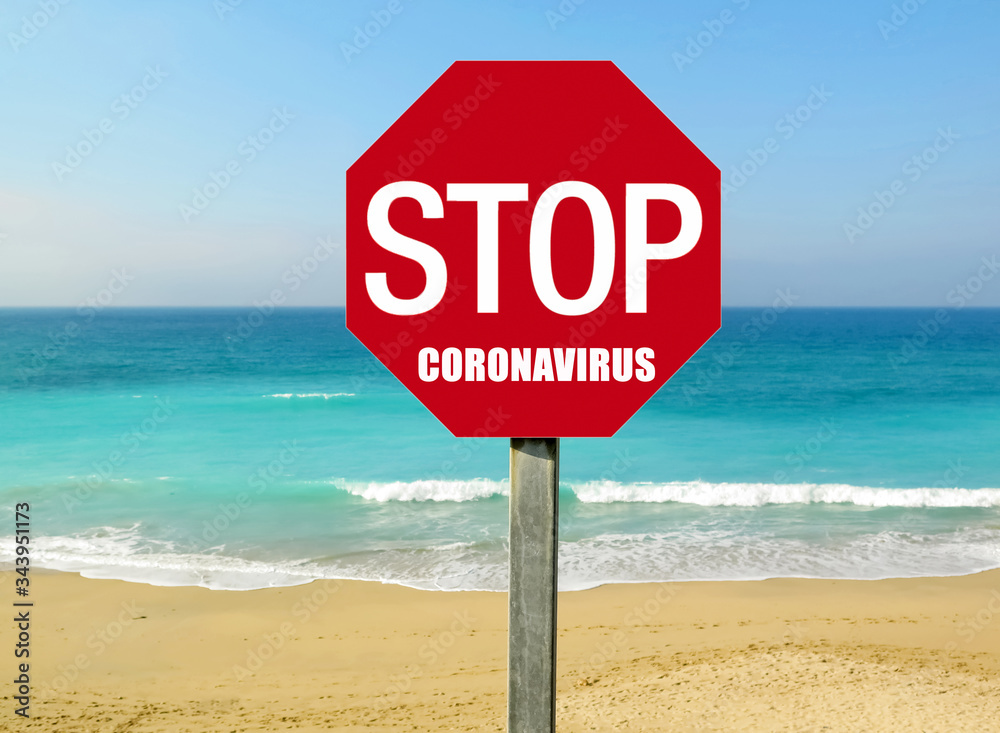 Stop sign at the beach in Spain. Coronavirus and travels, Tourism ...