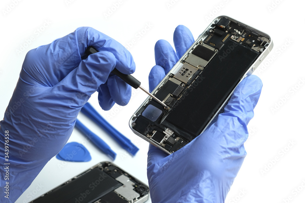 Technician repairing the Cell phone parts and tools for recovery repair ...