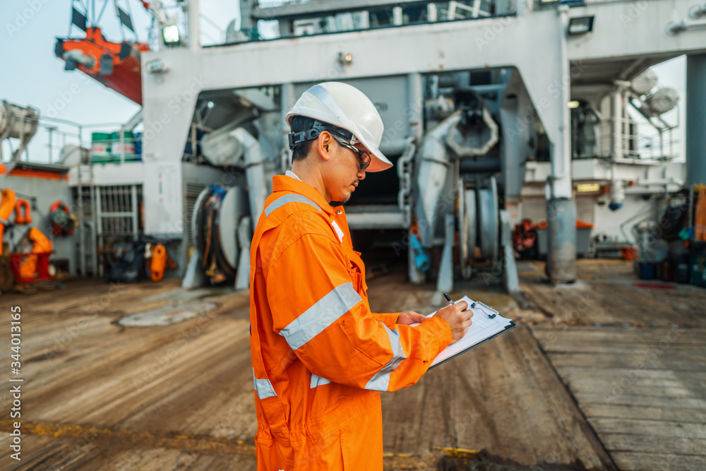 Filipino deck Officer on deck of offshore vessel or ship , wearing PPE ...