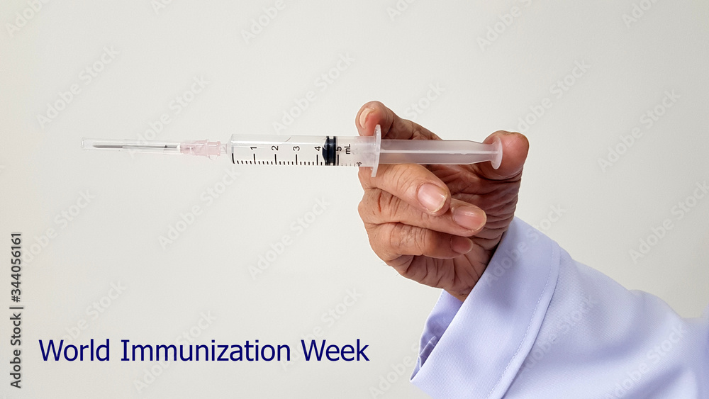 Doctor vaccinating on world immunization week. Vaccine used for ...