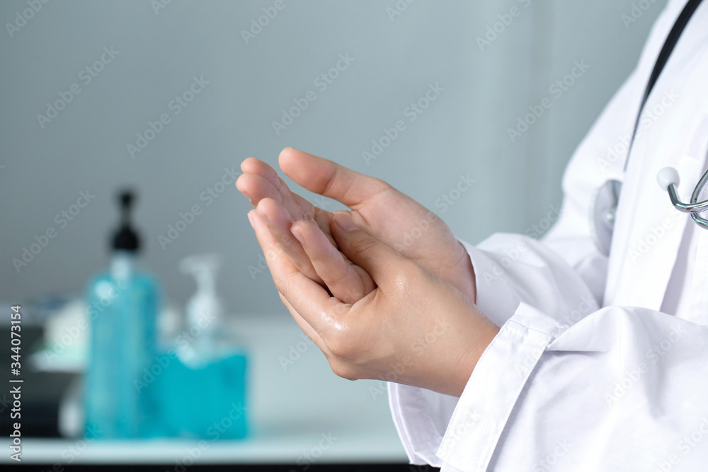 Closeup doctor hands washing with hand sanitizer gel.Coronavirus hand ...