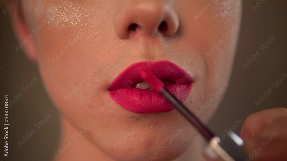 applying lipstick homo man put makeup pink lips portrait transvestite ...