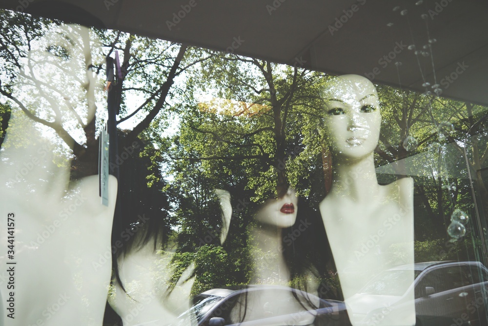Mannequins In Window Display Stock Photo | Adobe Stock