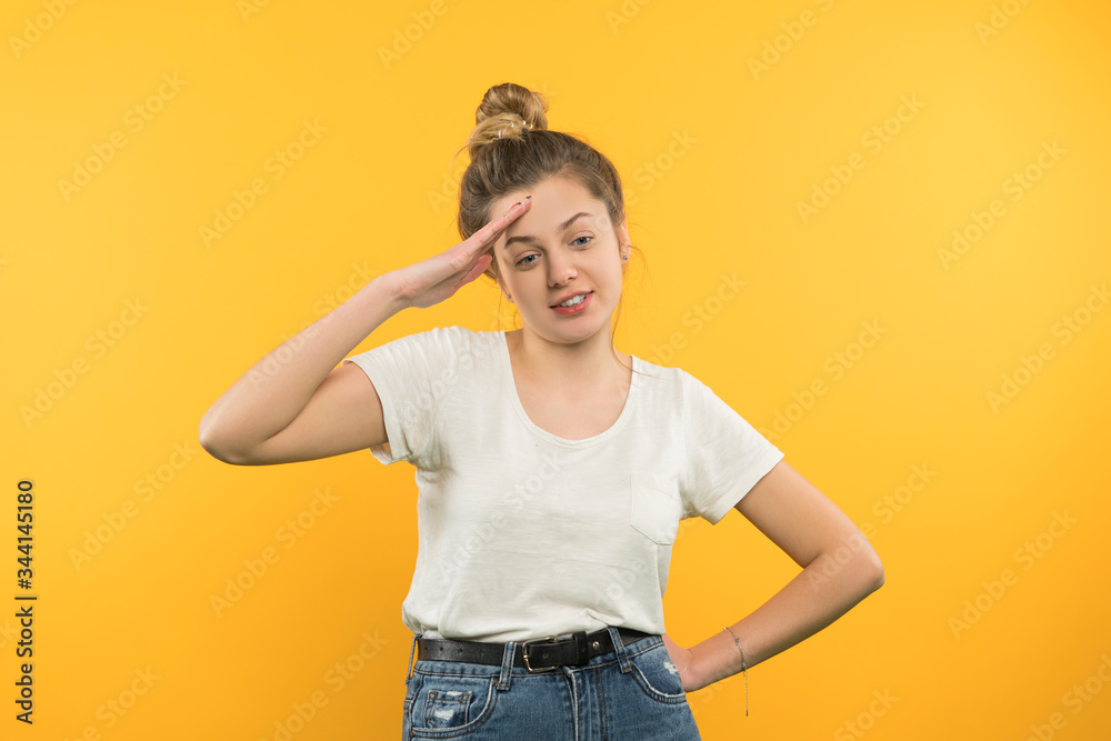 Portrait of a young displeased angry girl, emotional gestures, on a ...