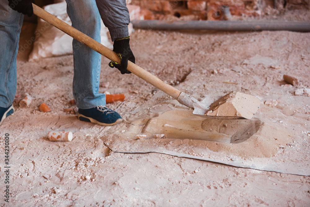 Closeup of repairman in uniform, professional builder working using ...