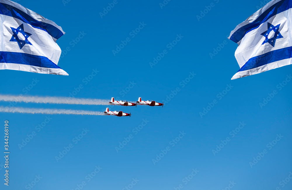 Streaming Israeli Flags and Air Acrobatic flight reciprocating aircraft ...
