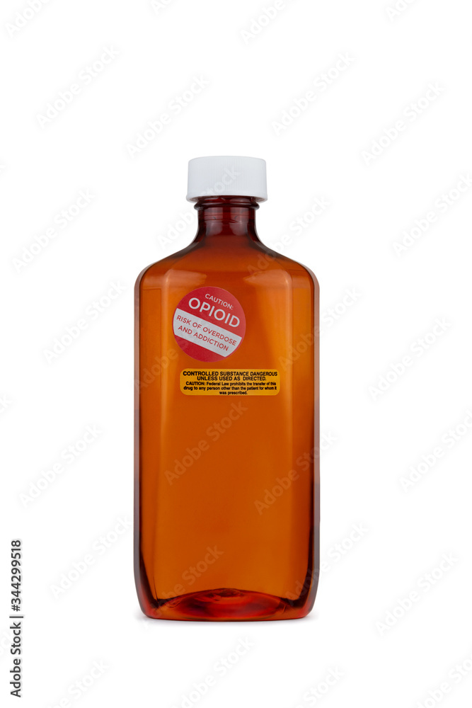 amber colored medicine bottle with opioid warning labels stating ...