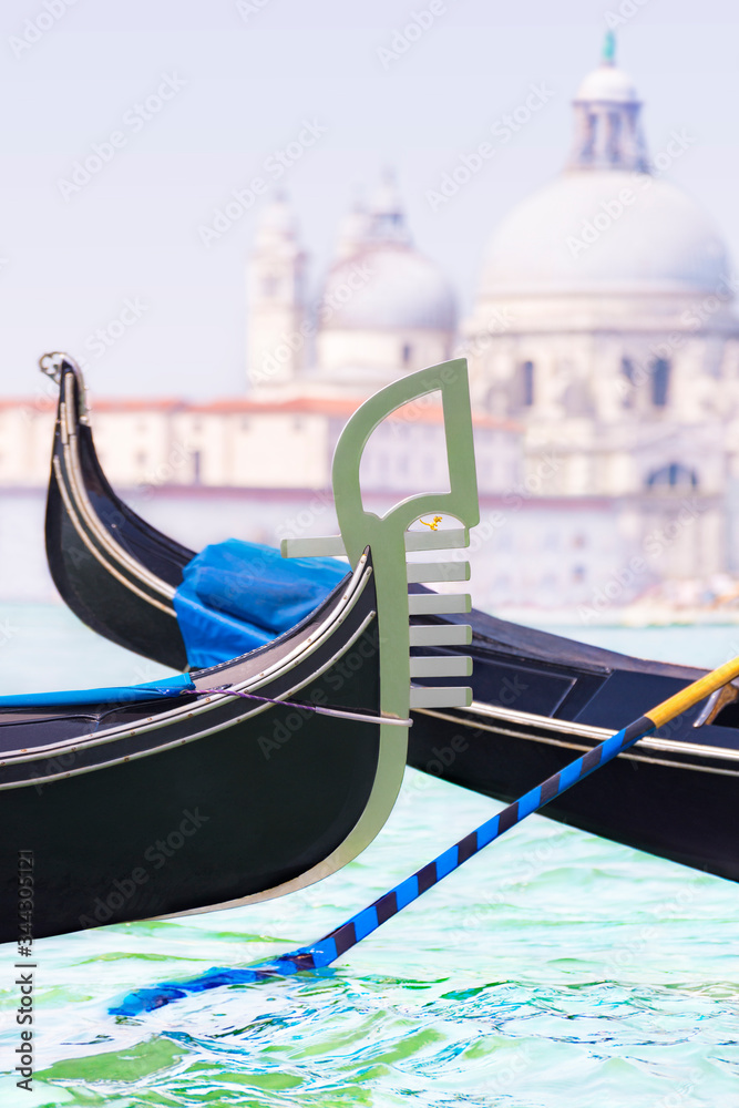 A gondolas tour on Grand Canal against Basilica di Santa Maria della ...