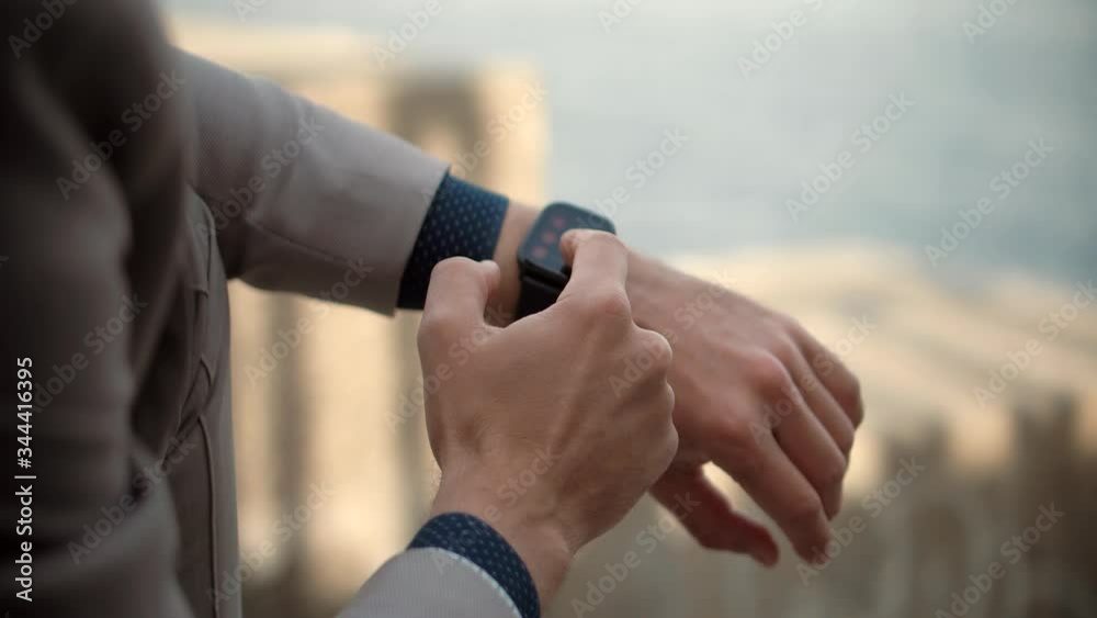 Businessman Scrolling On Display On Smartwatch.Man Using Smart Watch ...