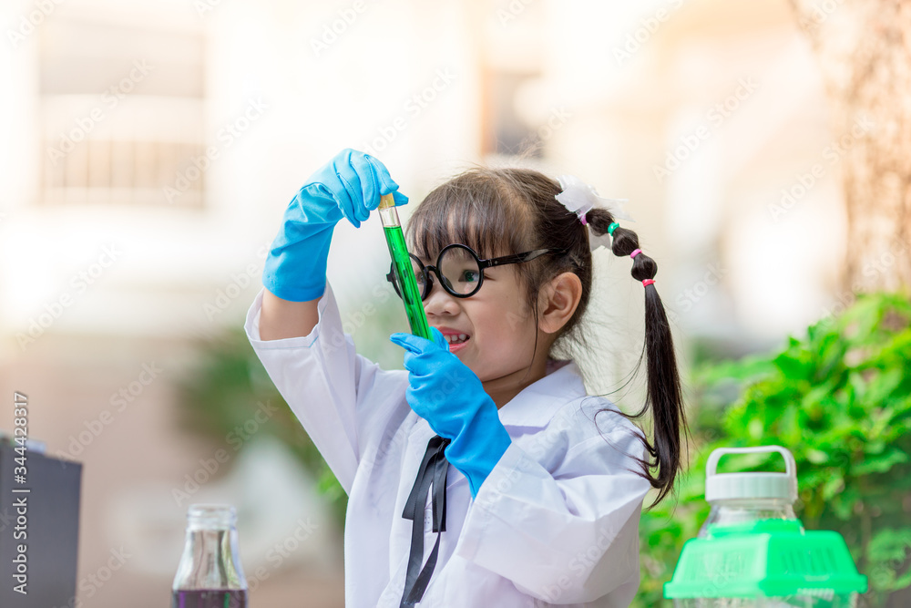 Close up view For a cute girl, a concept learning science process ...