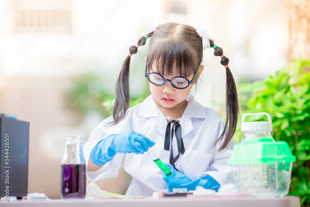 Close up view For a cute girl, a concept learning science process ...