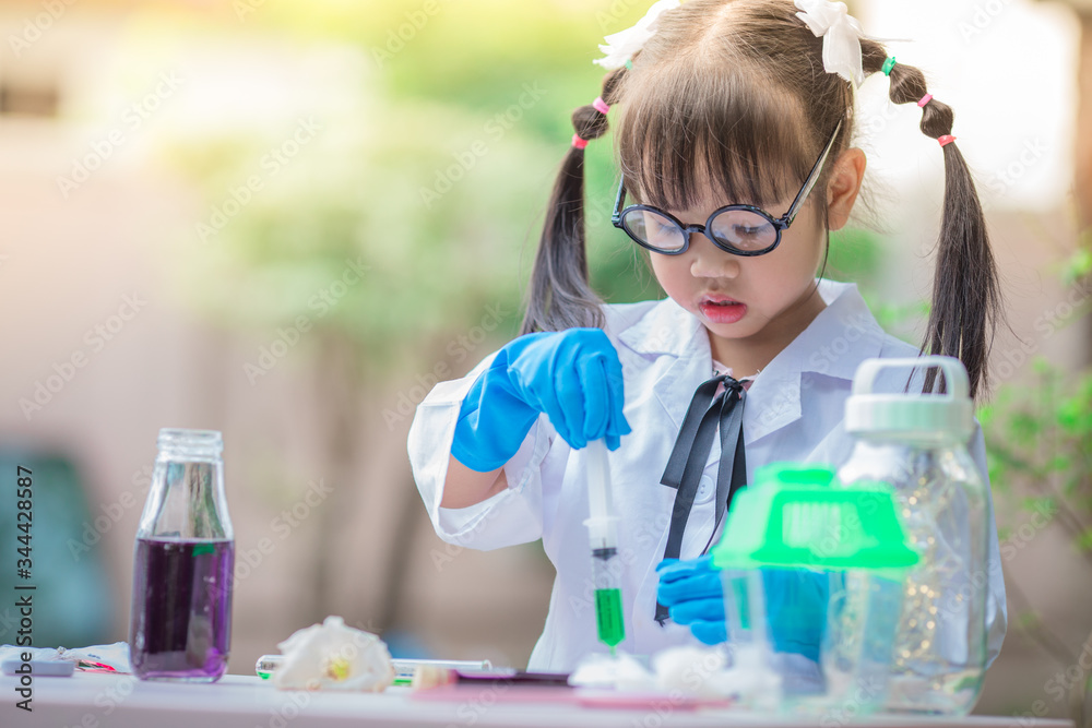 Close up view For a cute girl, a concept learning science process ...