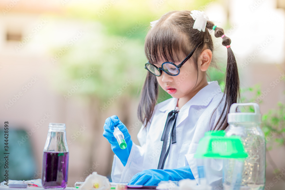 Close up view For a cute girl, a concept learning science process ...