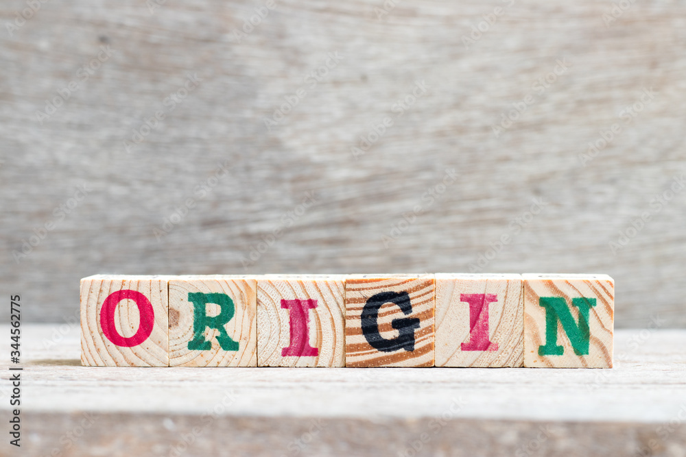Alphabet letter block in word origin on wood background Stock Photo ...