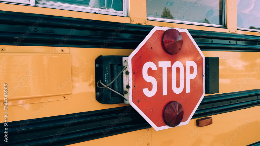 Stop Sign On School Bus Stock Photo | Adobe Stock