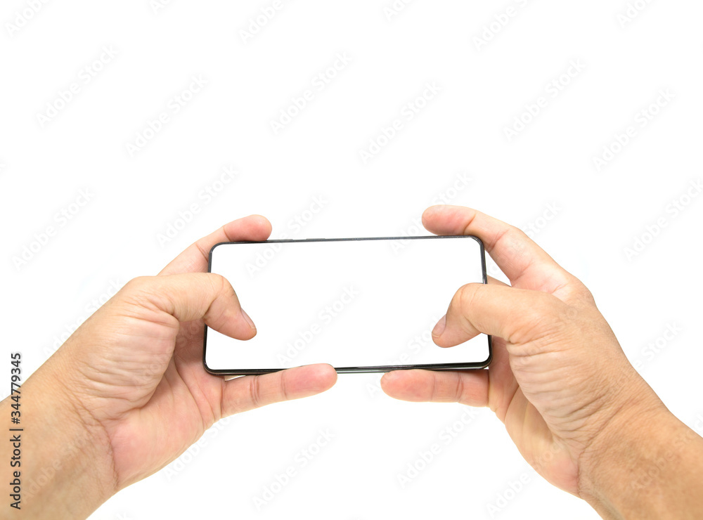 Human hand holding a virtual cell phone is playing game or watching ...