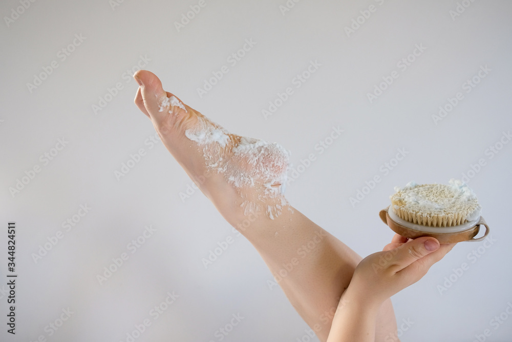 foot with rough skin and a dry heel with many cracks. The concept of ...