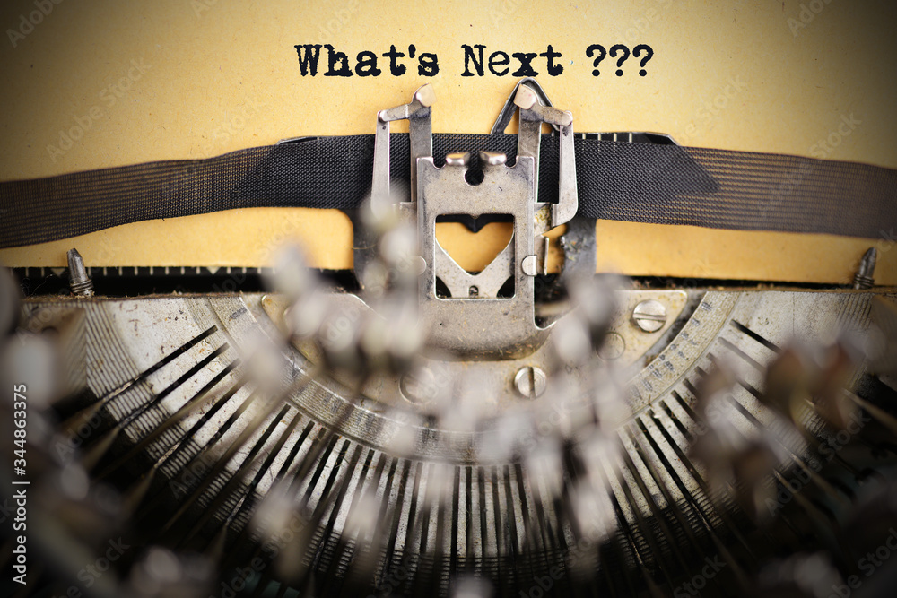 What is happening next question mark with old typewriter and text Stock ...
