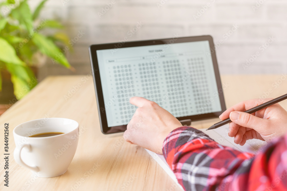 Online exam. girl student testing exercise. Examination test on the ...