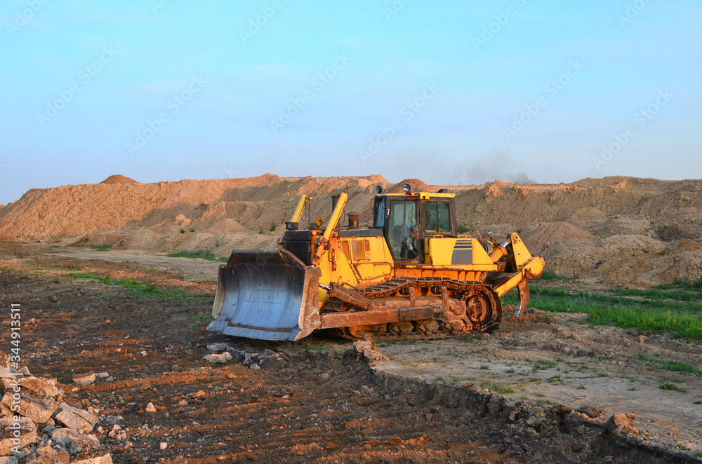Bulldozer with bucket for pool excavation and utility trenching. Dozer ...