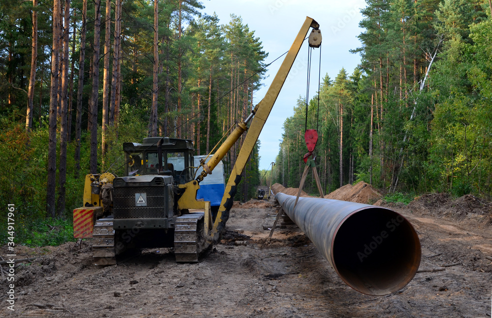 Natural gas pipeline construction work. A dug trench in the ground for ...