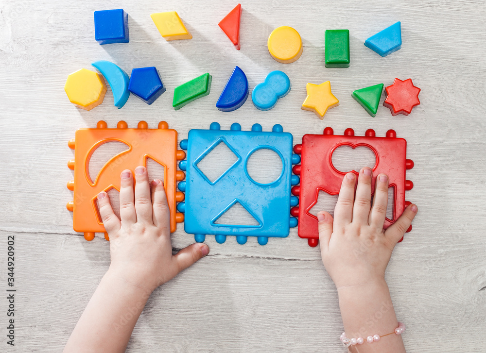 Sorting montessori training. Gray background. Objects and forms for ...