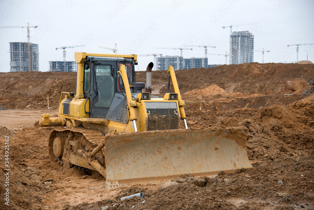 Track-type dozer for pool excavation and utility trenching. Bulldozer ...