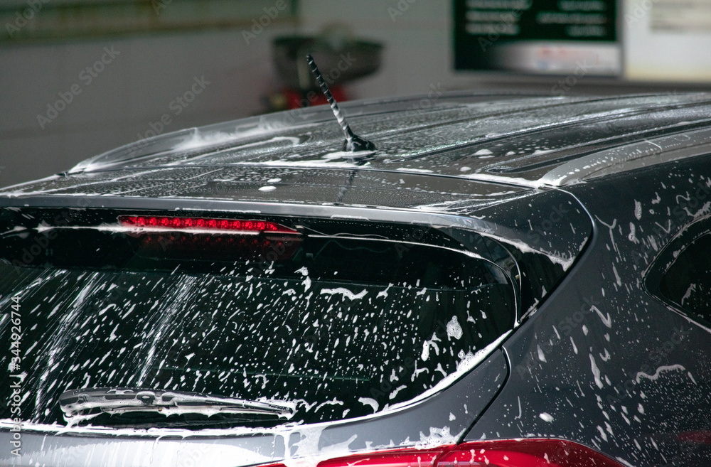 SUV car in a car wash back view and rooftop Stock Photo | Adobe Stock