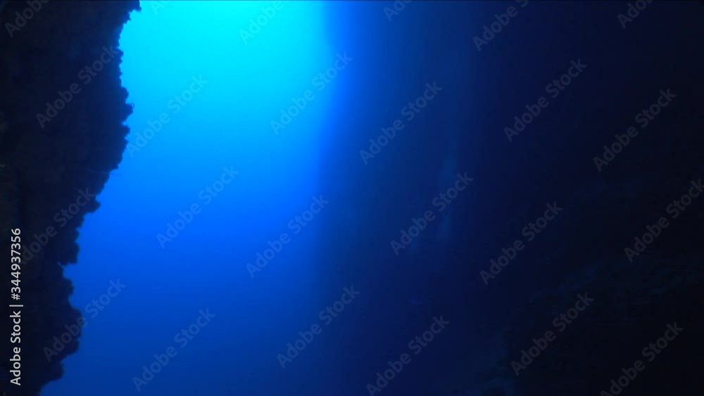 cave diving in deep blue ocean scenery for scuba divers to explore ...