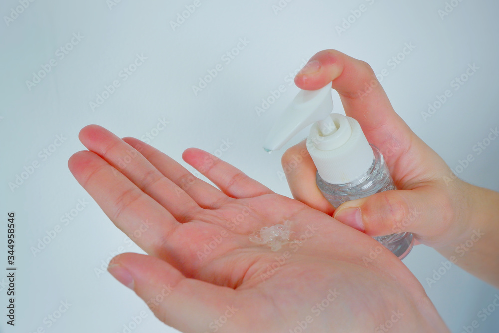 Women washing hands with alcohol gel or antibacterial soap sanitizer ...