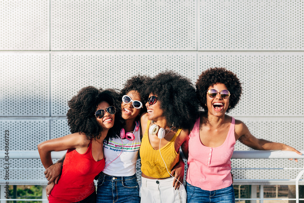 Afro women friends hanging out in the city Stock Photo | Adobe Stock