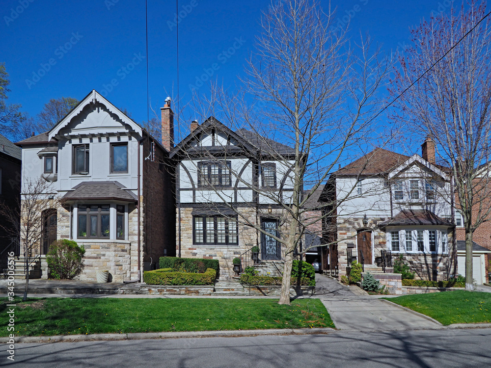 Street of small detached two story middle class homes Stock Photo ...
