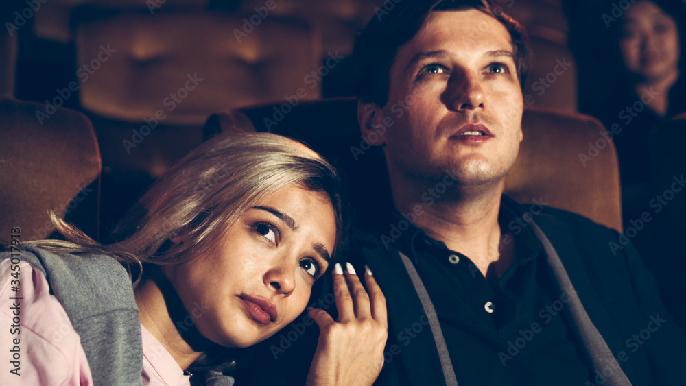 People audience watching movie in the movie theater cinema. Group ...