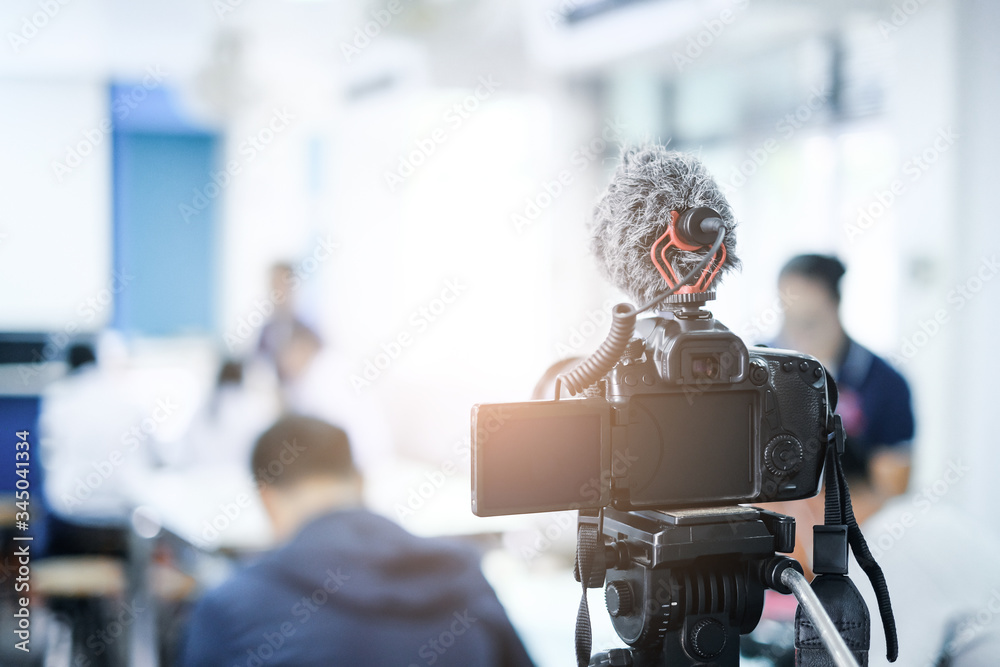 camera set up on tripod recording presentation performance, vlog ...