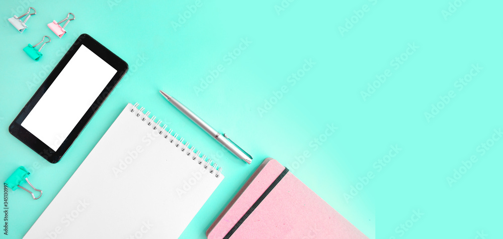 Feminine office flatlay with empty notepad, smartphone and stationery ...