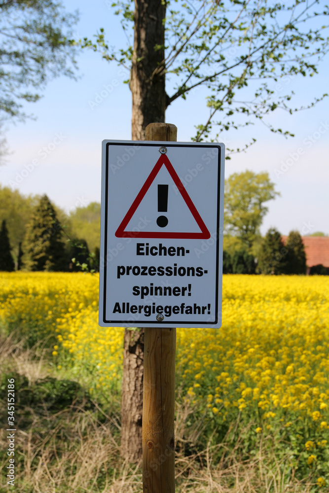 sign with the german text caution oak processionary Stock Photo | Adobe ...