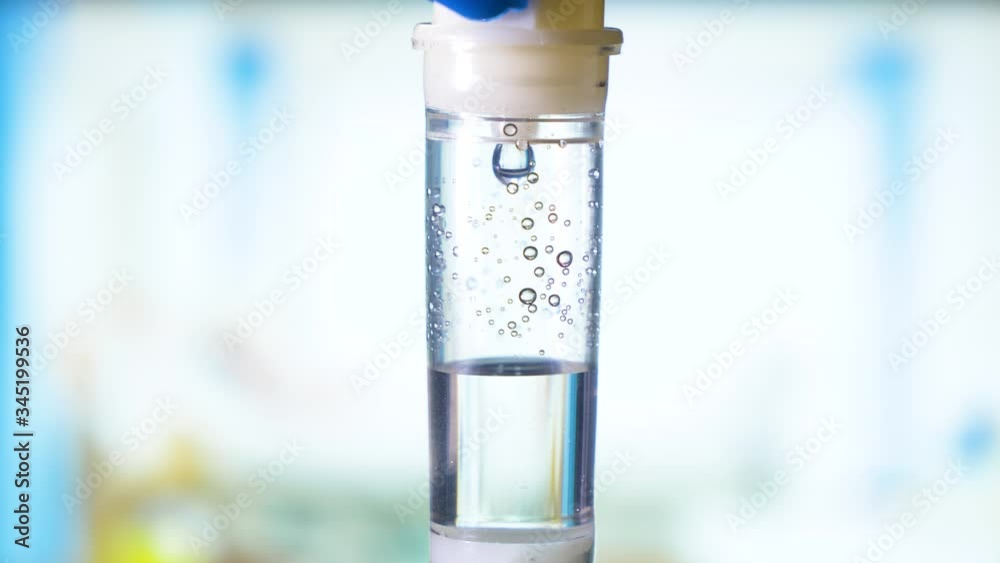 Dripping medical perfusion close up equipment in clinic background ... Dripping medical perfusion close up equipment in clinic background ...