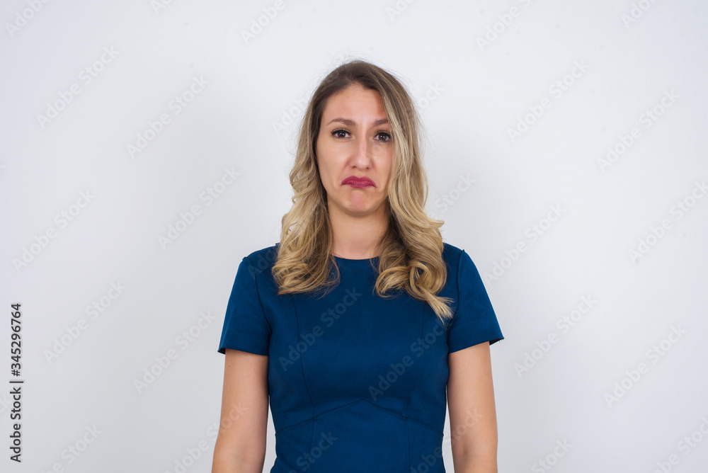 Beautiful face of sad woman crying desperate and depressed with tears ...