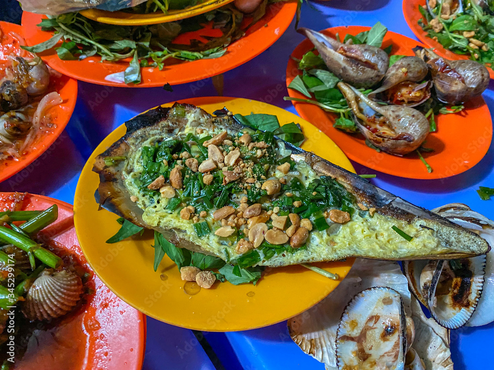 Vietnamese dish- grilled pen shell mixed with scallion and peanuts ...