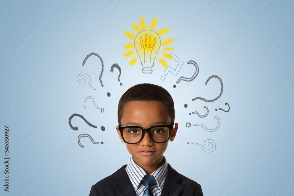 Handsome african american little boy wearing glasses and thinking with many question marks and ...