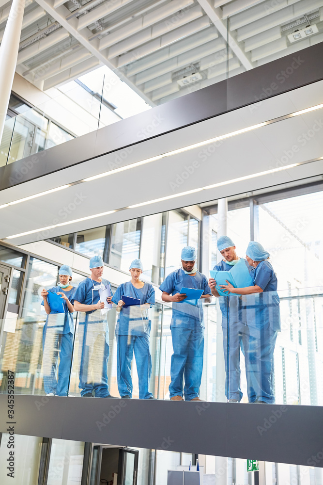 Group of surgeons with medical records at the briefing Stock Photo ...