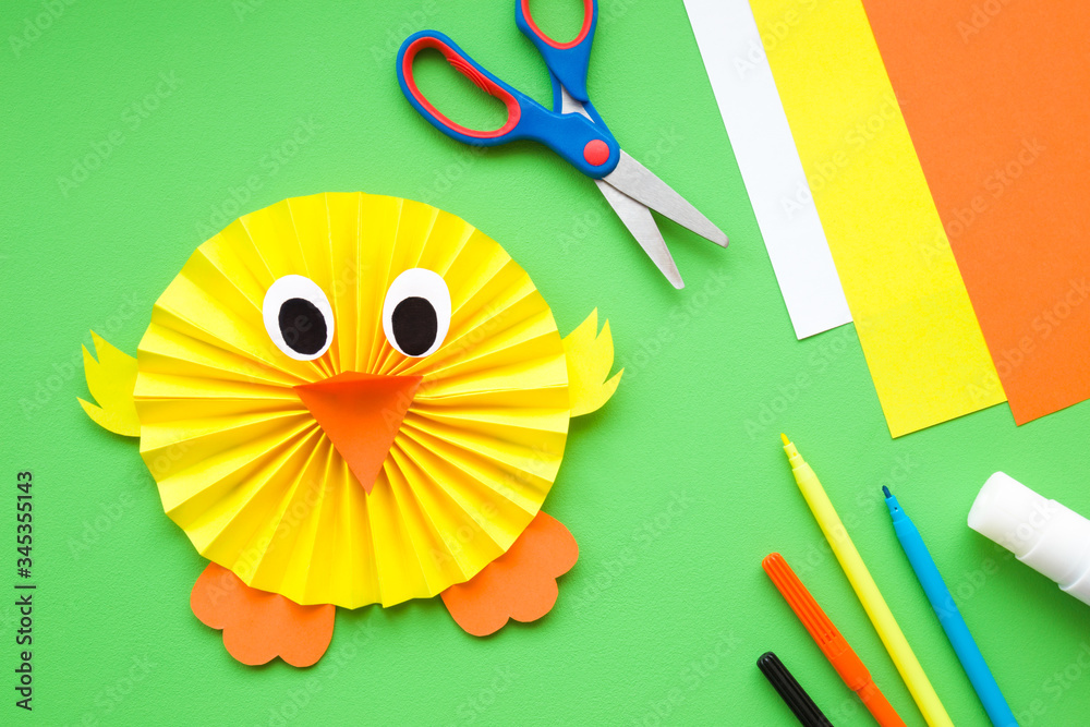 Cute, yellow chick who folded and created from paper for kids. Colorful ...