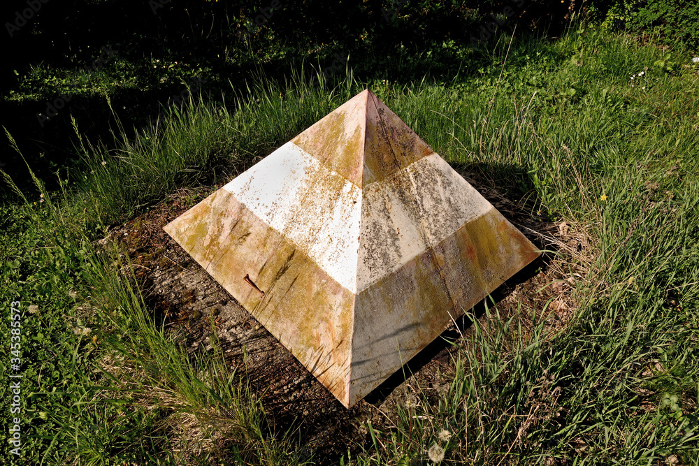 Protective metal cover for a hydrant in the ground in the shape of a ...