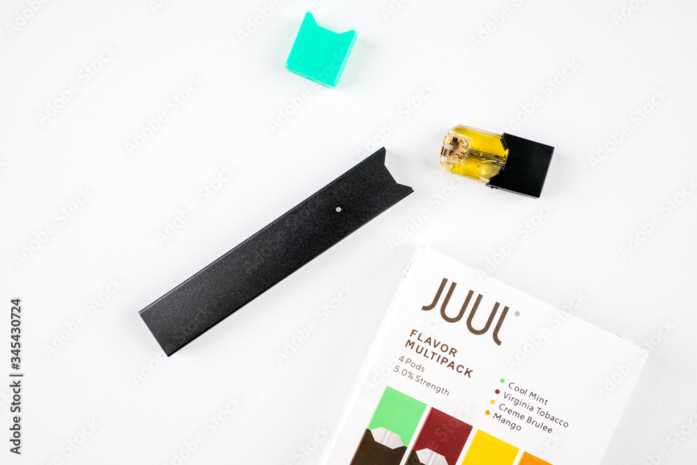 Oslo, Norway - 05.01.2020: Juul vape and juul flavoured pods isolated ...