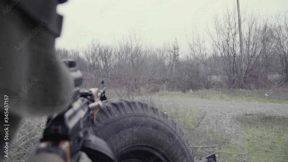 Special Forces soldiers combat uniforms fighting in battle aiming gun ...