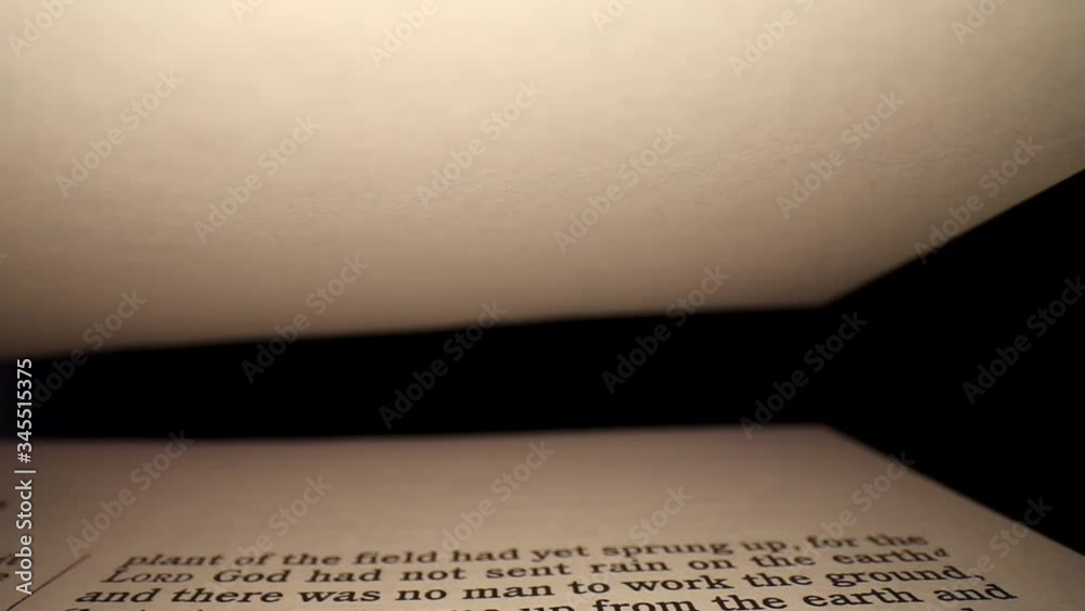 Video „Pulling back through Genesis Chapter Two, blank page on top ...